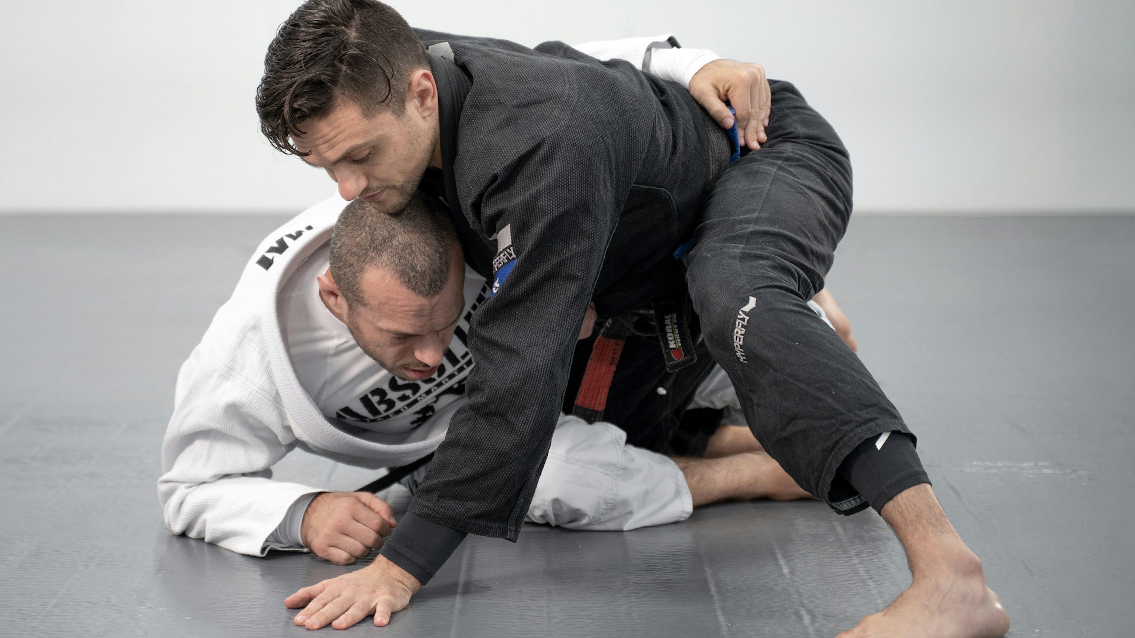 “Underhook Half Guard” by Lachlan Giles • SUBMETA