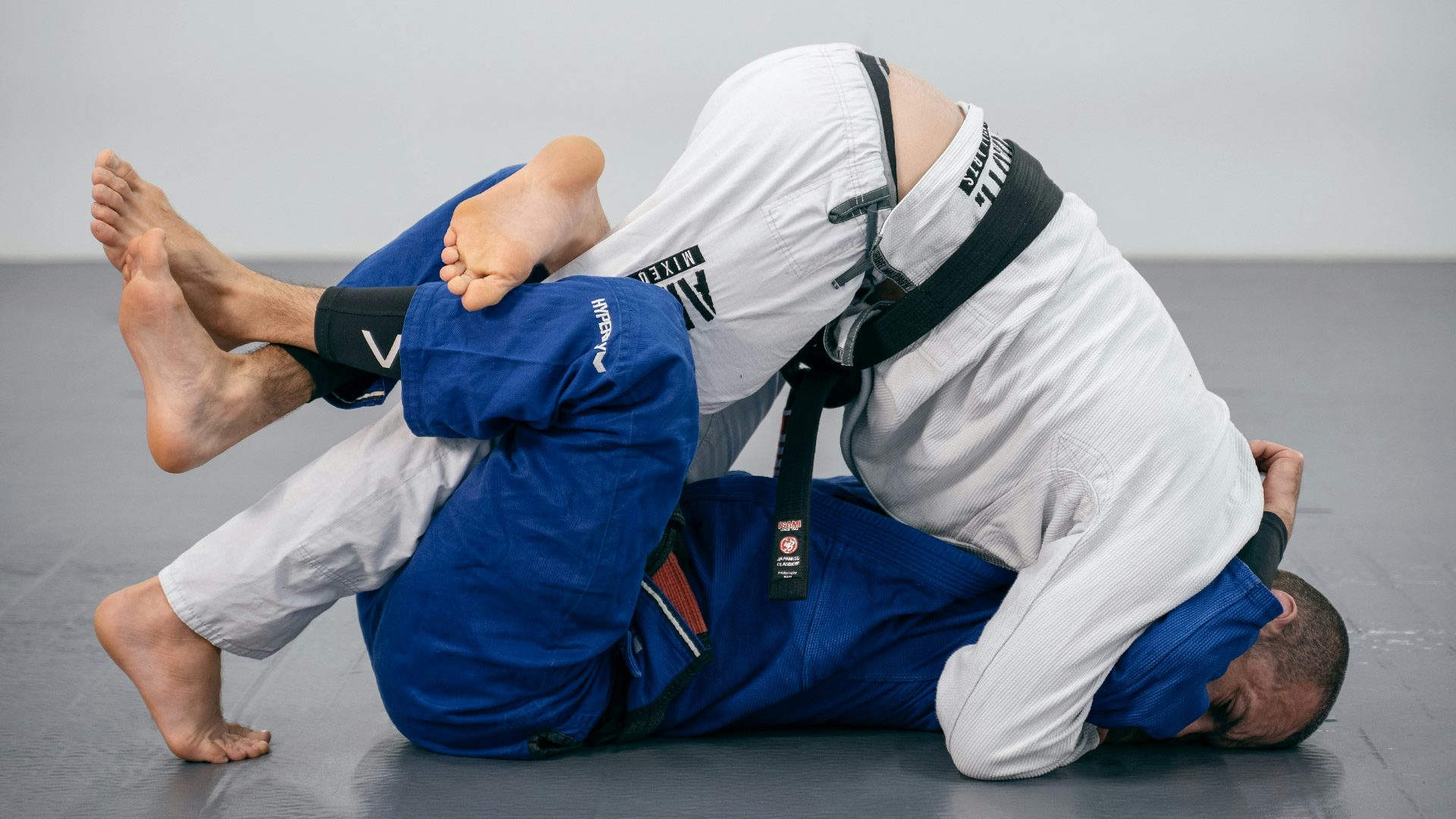 “Passing Half Guard” by Lachlan Giles • SUBMETA