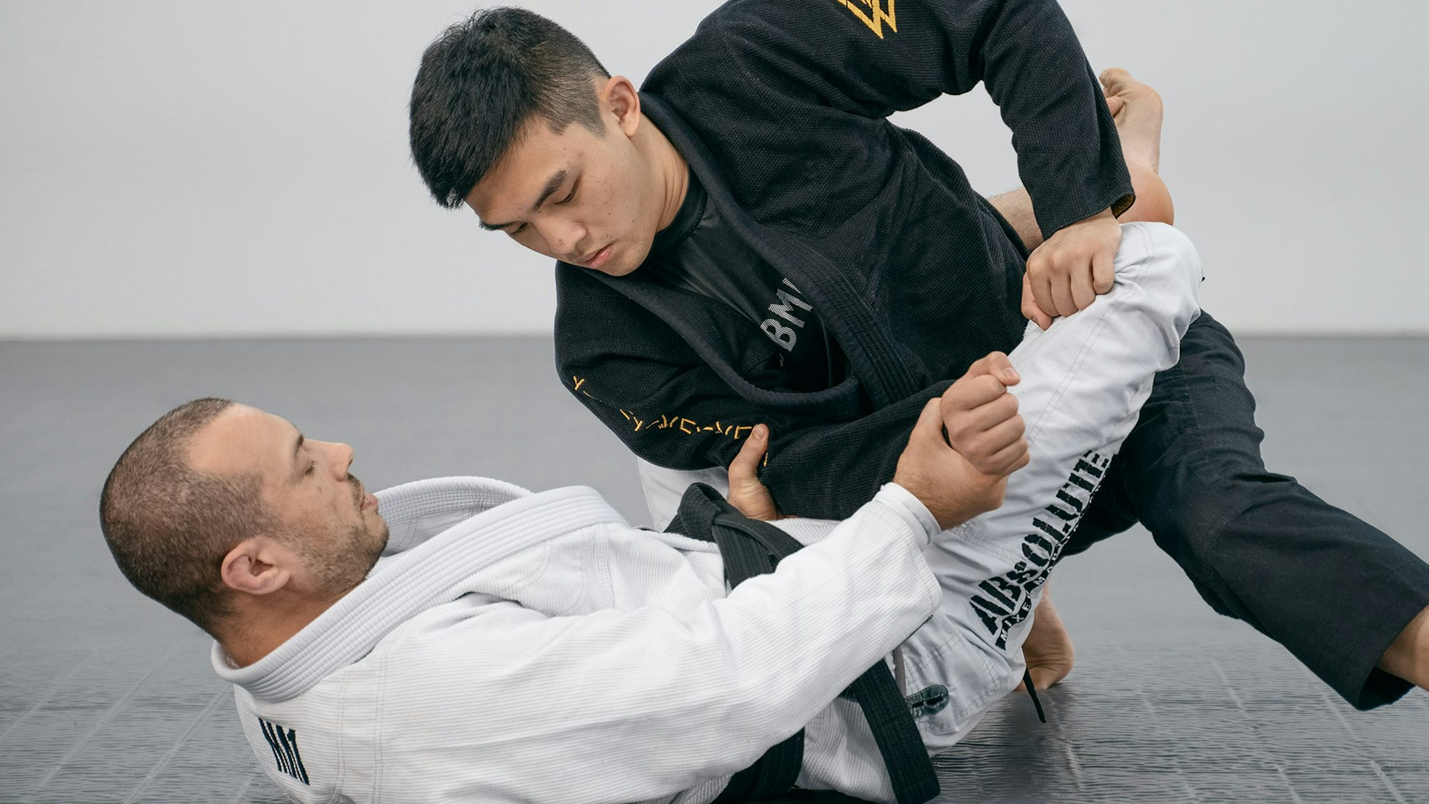 “Closed Guard Arm Across” by Lachlan Giles • SUBMETA